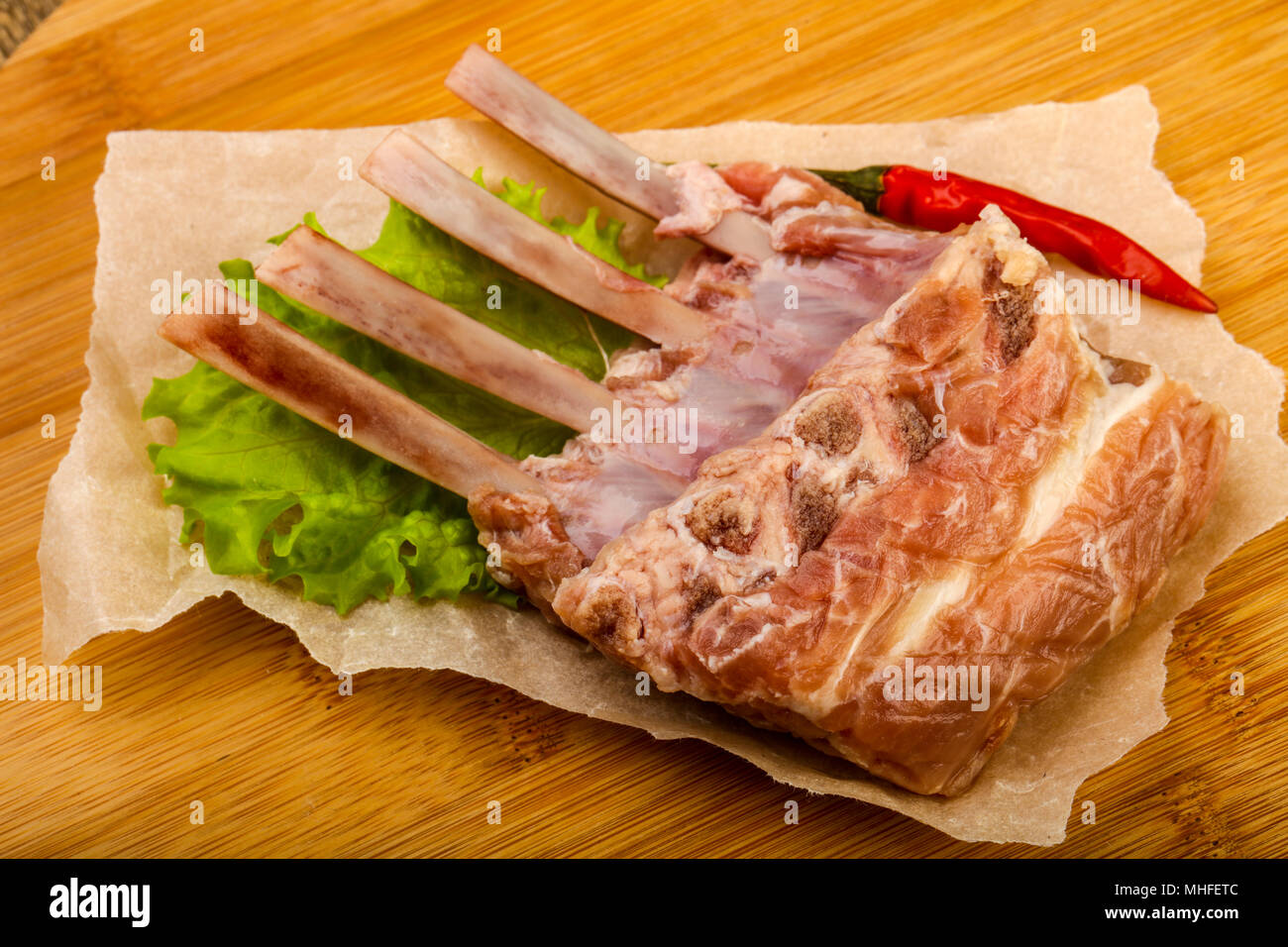 Raw lamb ribs with pepper ready for cooking Stock Photo - Alamy