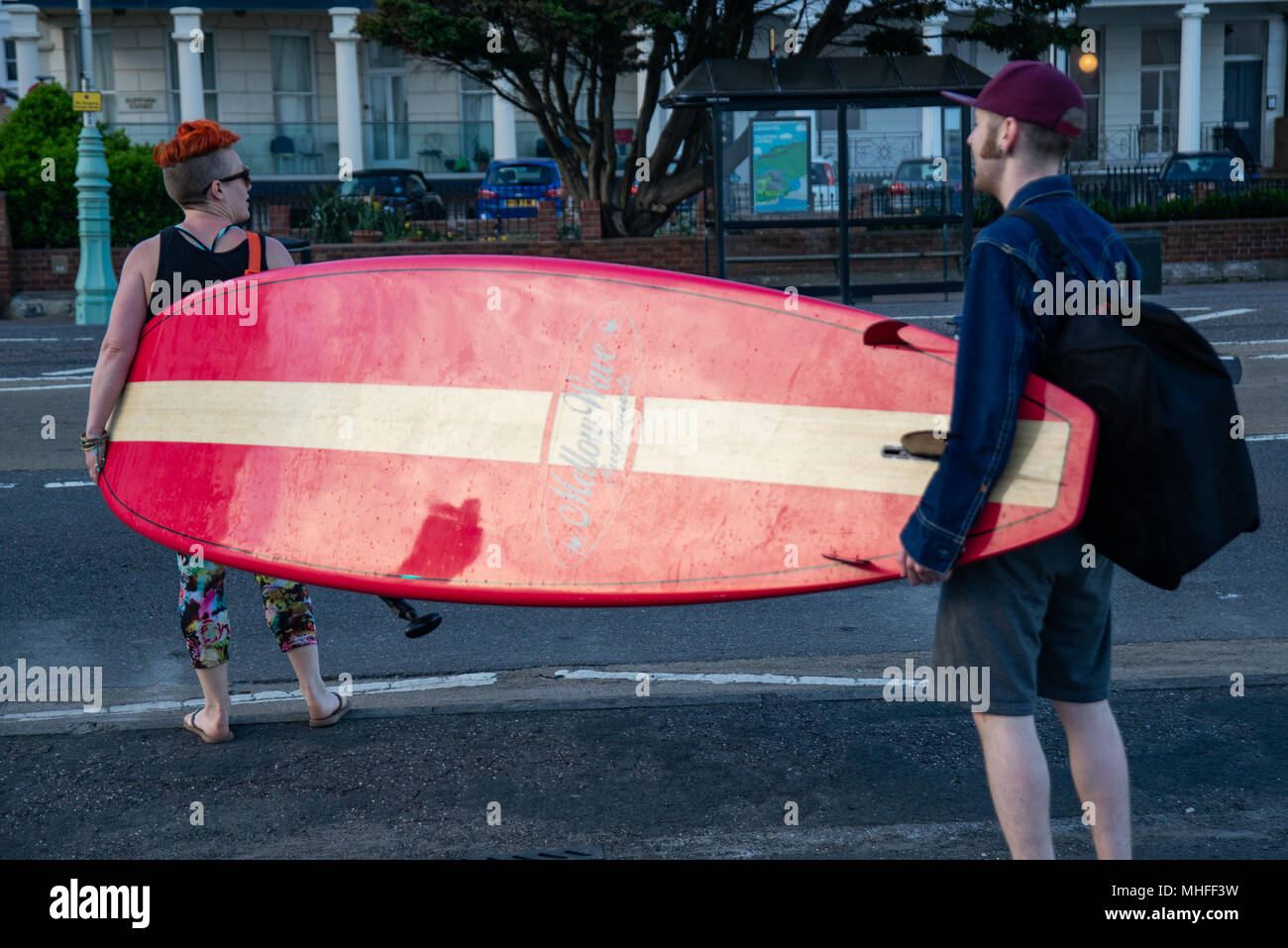 Surfer Carrying A Red Surfboard High Resolution Stock Photography and ...