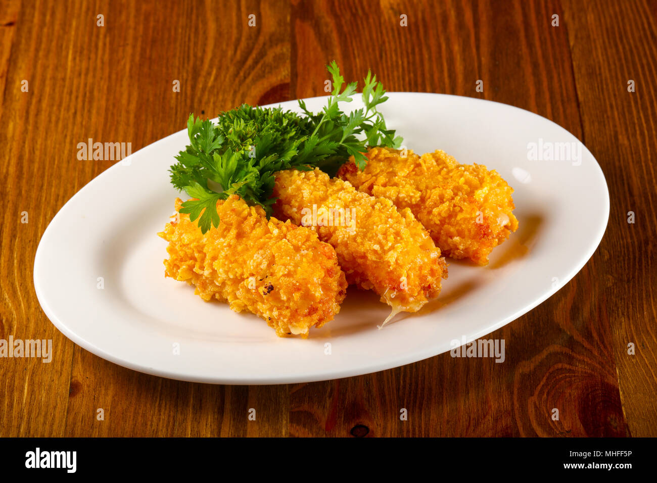 Roasted cheese sticks Stock Photo - Alamy