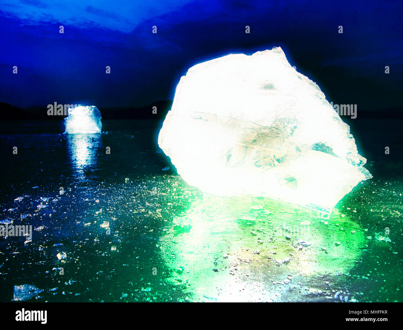 Abstract effect. Ice shard and cracked ice texture on melring glacier ...