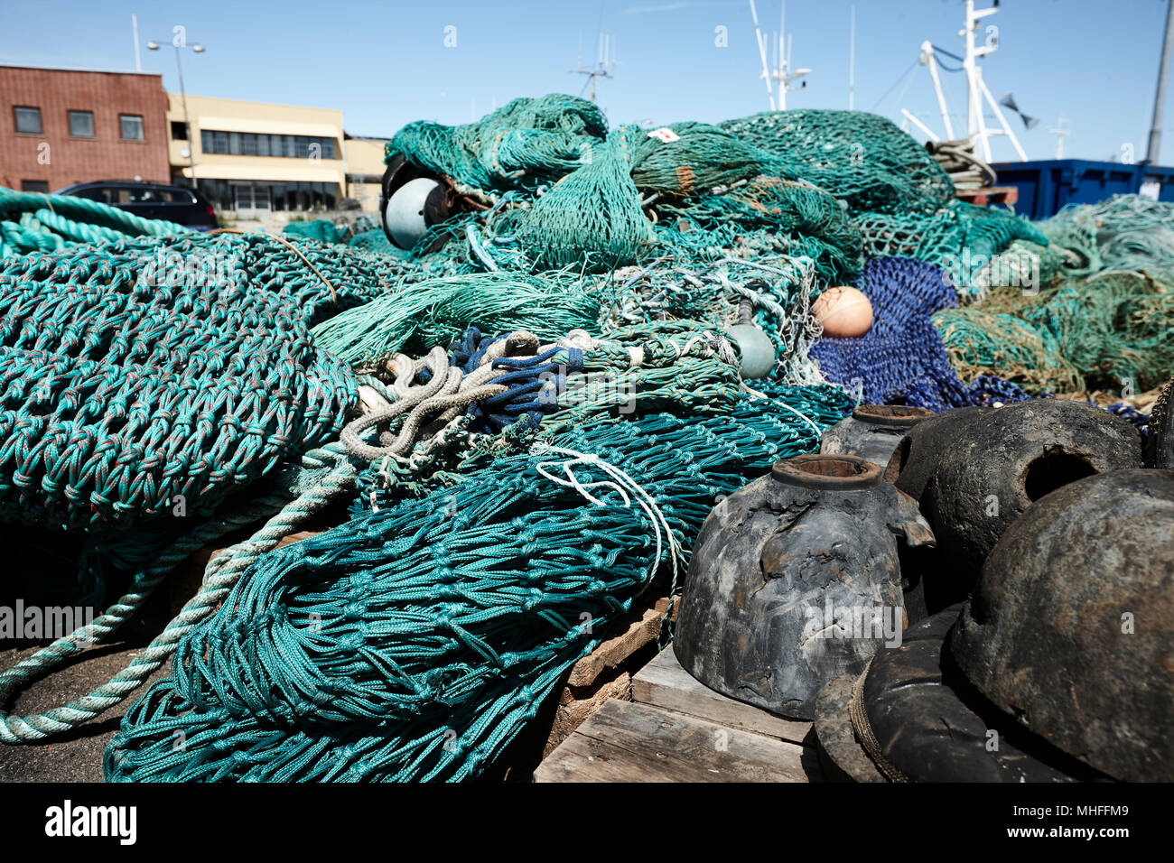Harbor facilities and fishing net Stock Photo - Alamy
