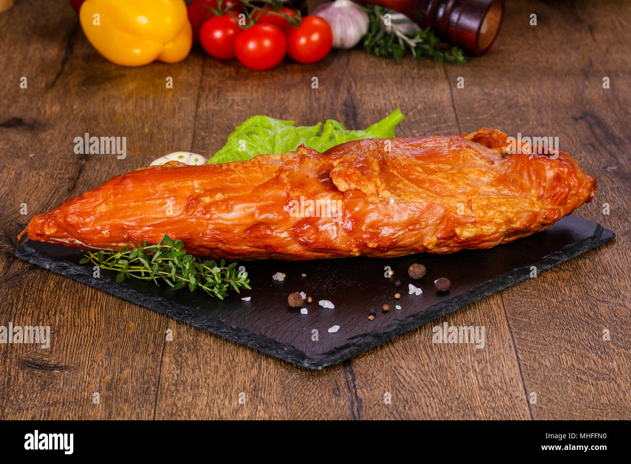 Smoked pork meat over the wooden background Stock Photo - Alamy