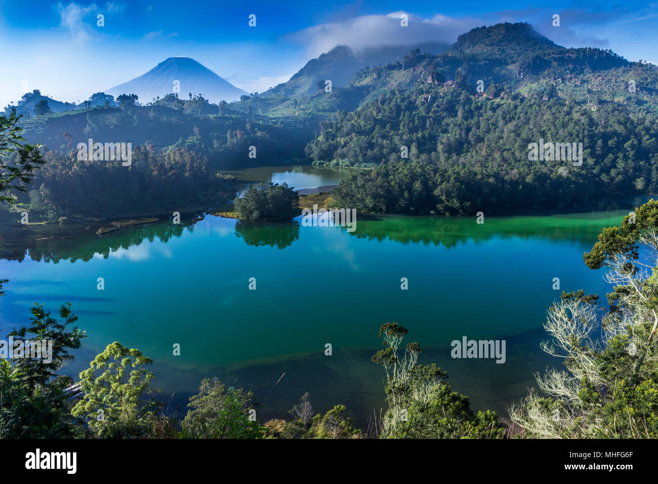 Scenic Green Lake and Mountain in the morning, in Dieng Plateau ...