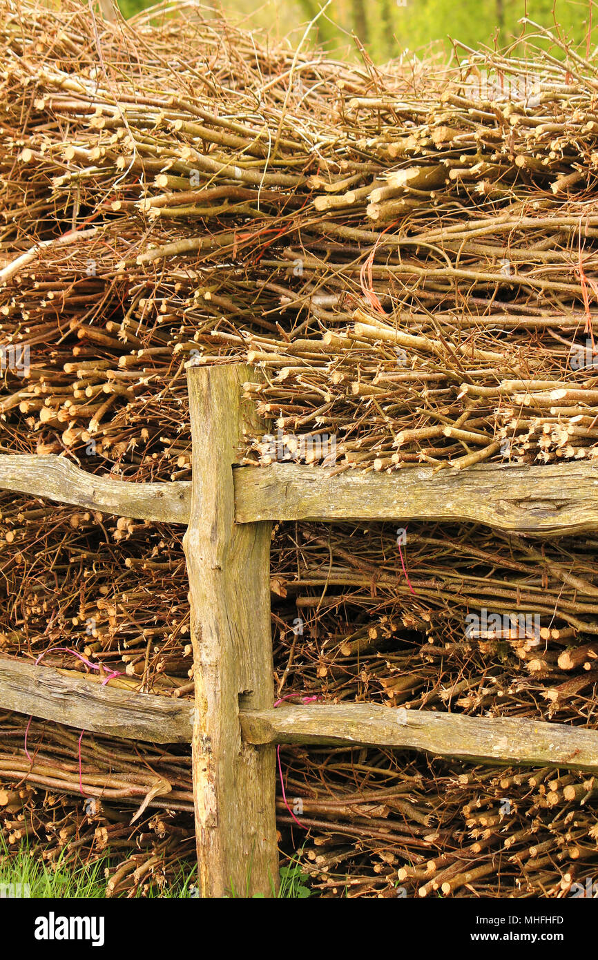 Chopped wood wall and wooden fence Stock Photo - Alamy