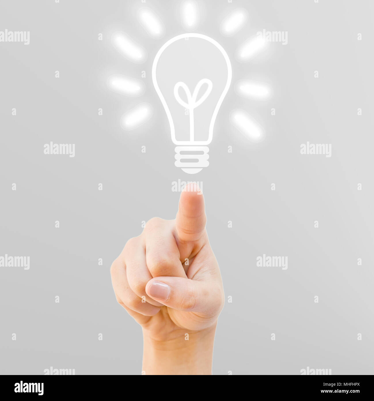 image finger touch light bulb Stock Photo - Alamy