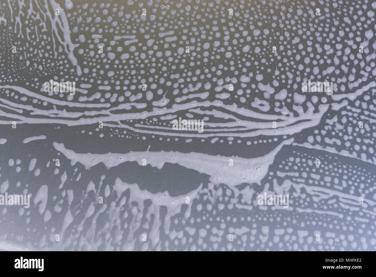 Soap patterns on a car bonnet Stock Photo - Alamy