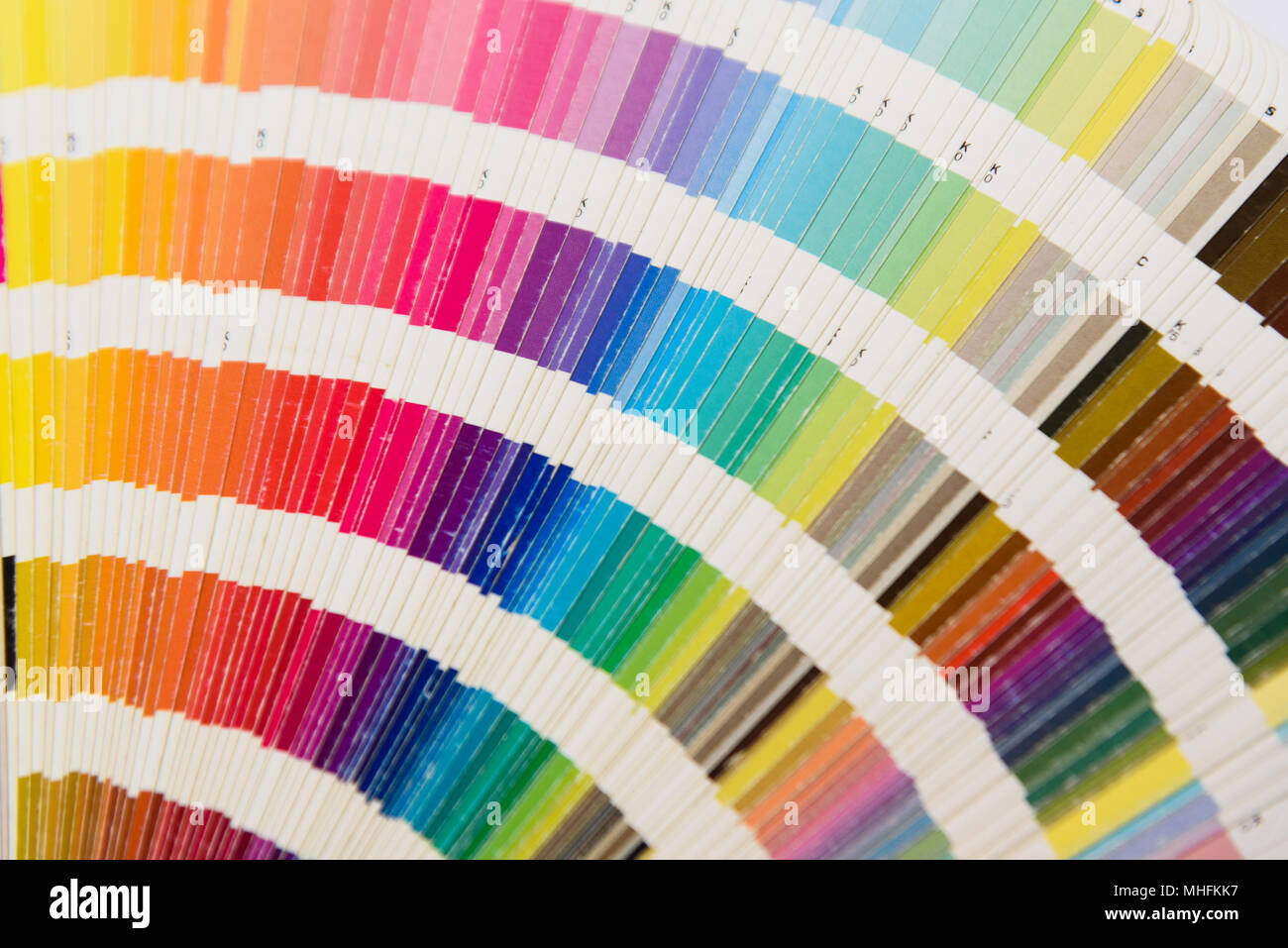 A used Fanned array of color printing swatches Stock Photo - Alamy