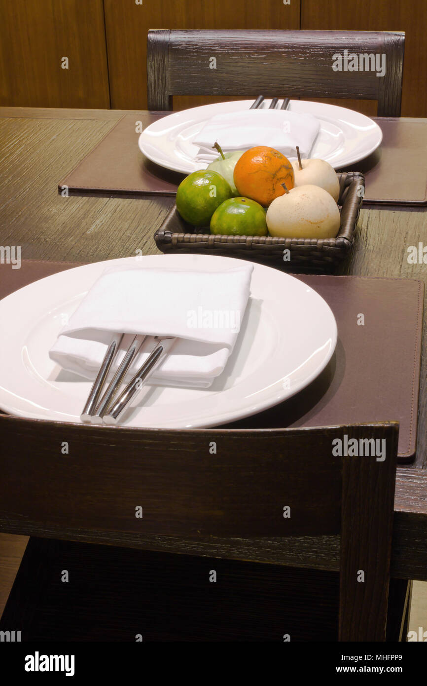 Modern kitchen table with fruits Stock Photo - Alamy