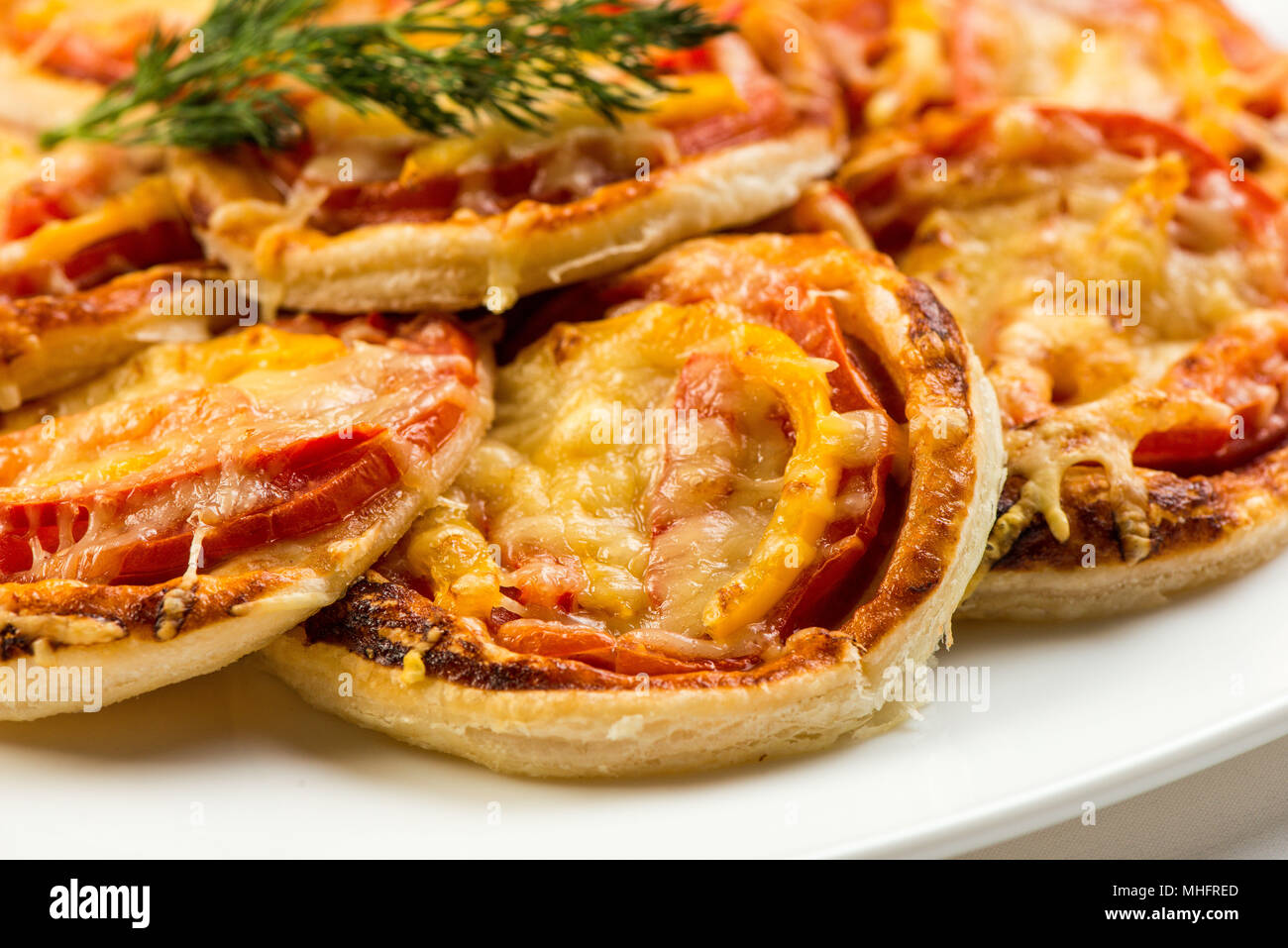 Mix of mini pizzas on a stone try , on white background Stock Photo - Alamy
