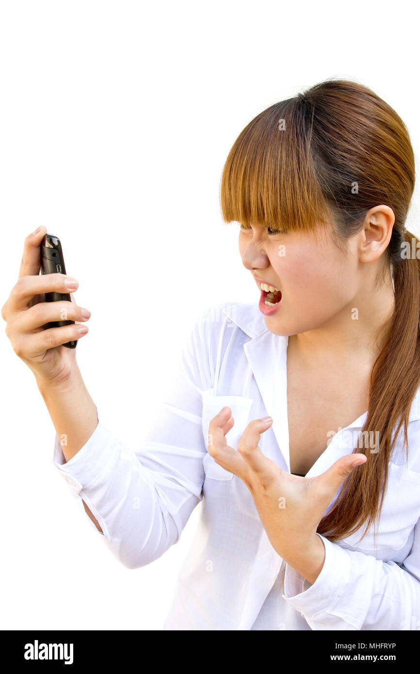brunette woman screaming at phone Stock Photo - Alamy