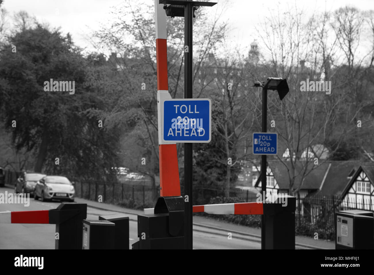 Toll road sign with barrier and price with selective color Stock Photo ...