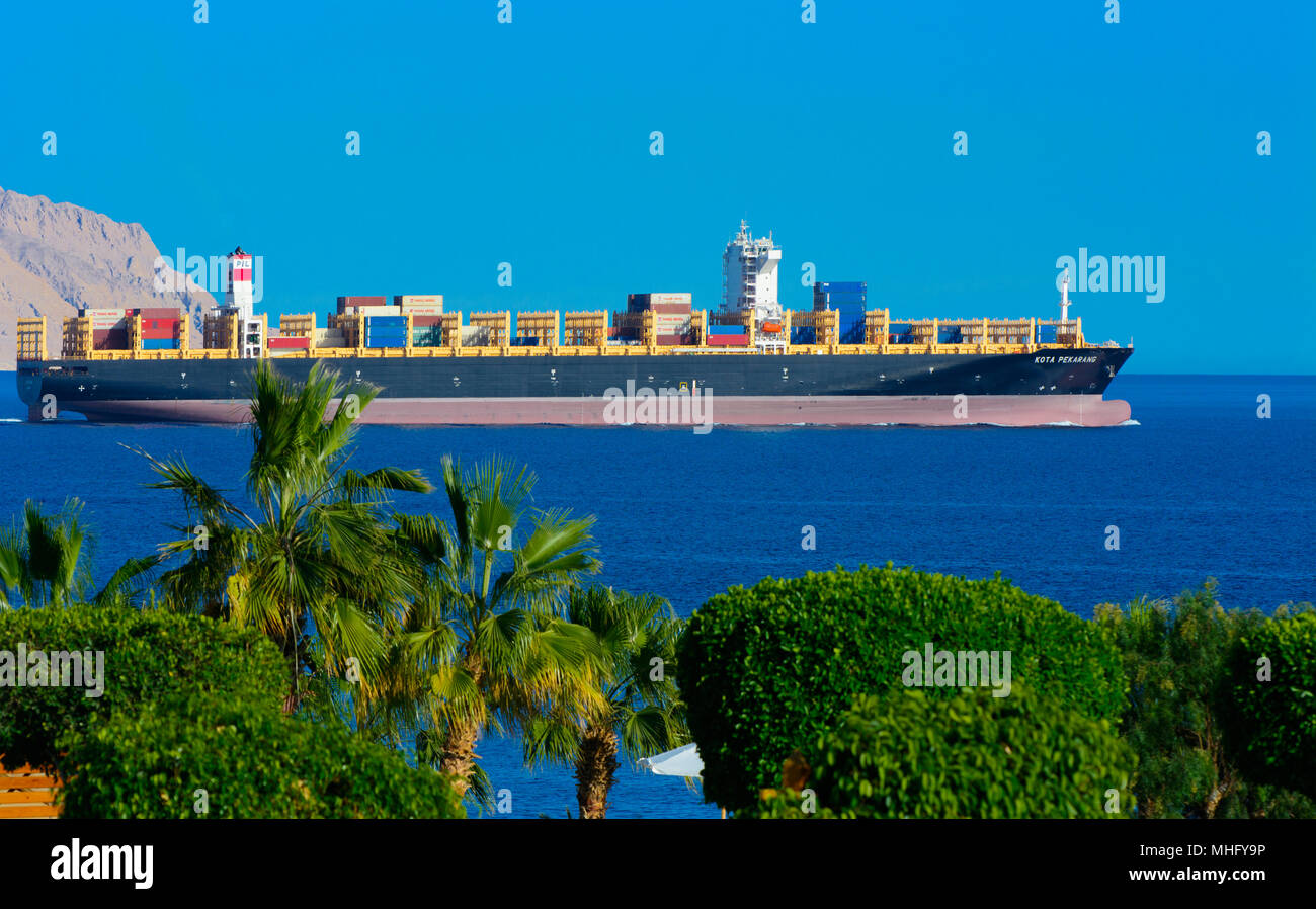 Sharm el-Sheikh, Egypt - March 14, 2018. A huge cargo ship carries ...