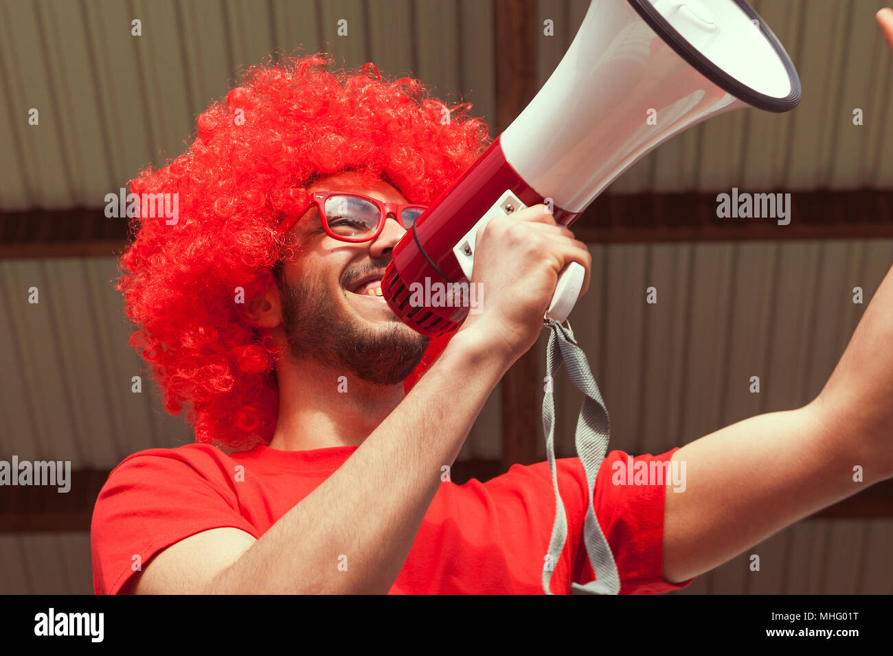Football fan with megaphone hi-res stock photography and images - Alamy