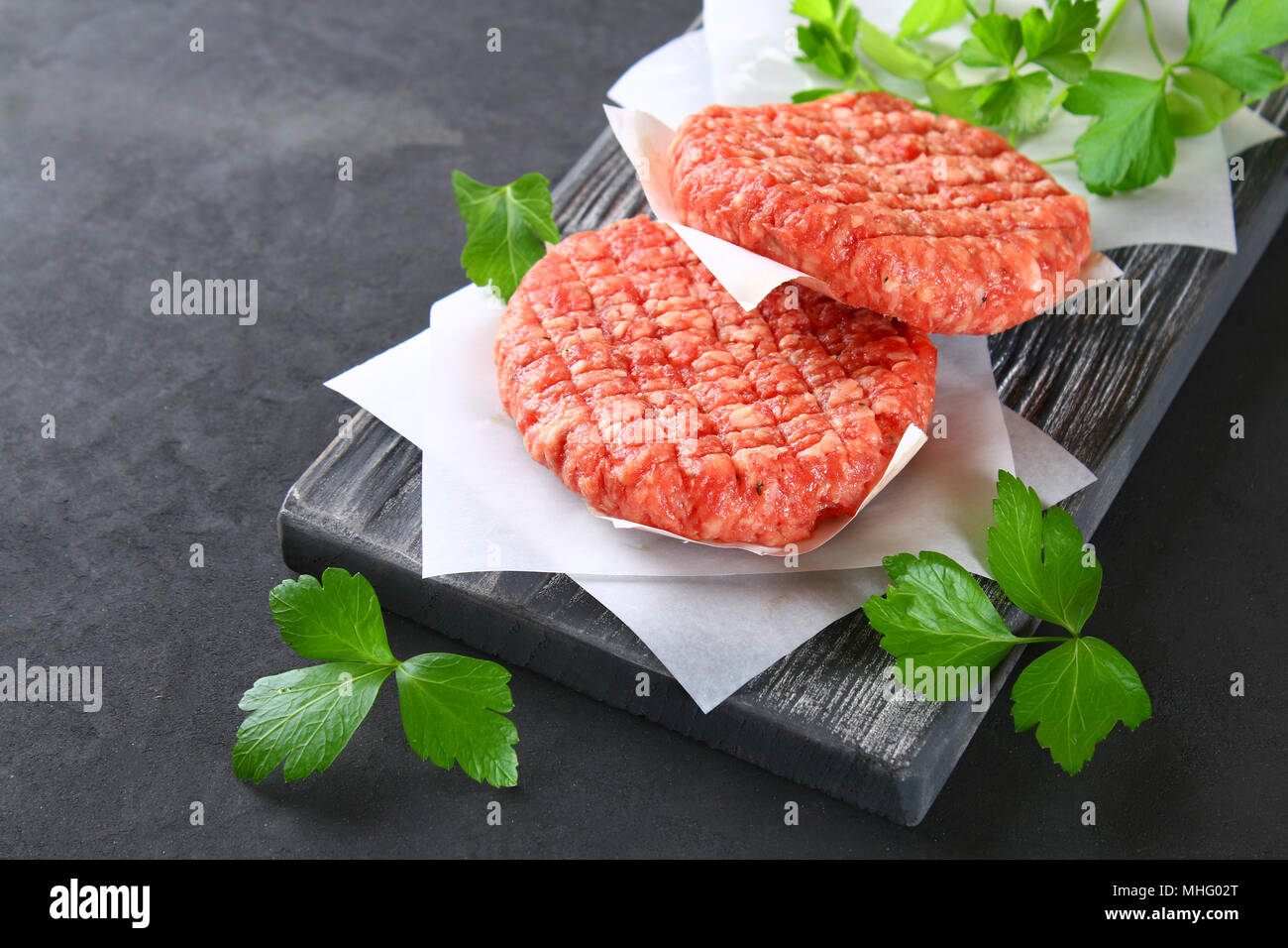 Raw minced meat for home made grill burgers cooking with spaces and ...