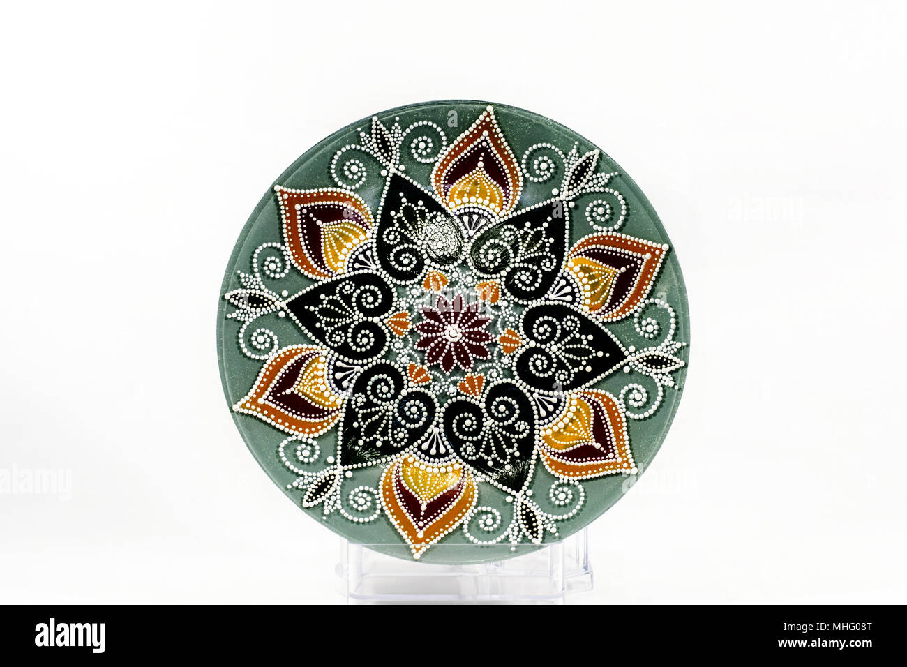 Decorative ceramic dish painted with hands. Art, handmade Stock Photo ...