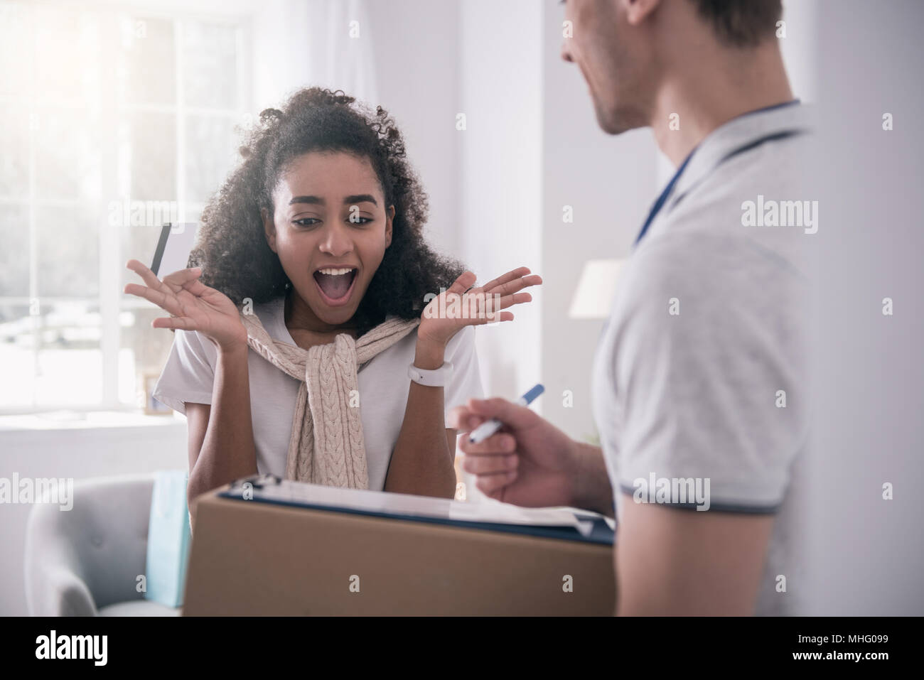 Pleasant happy woman being excited Stock Photo - Alamy