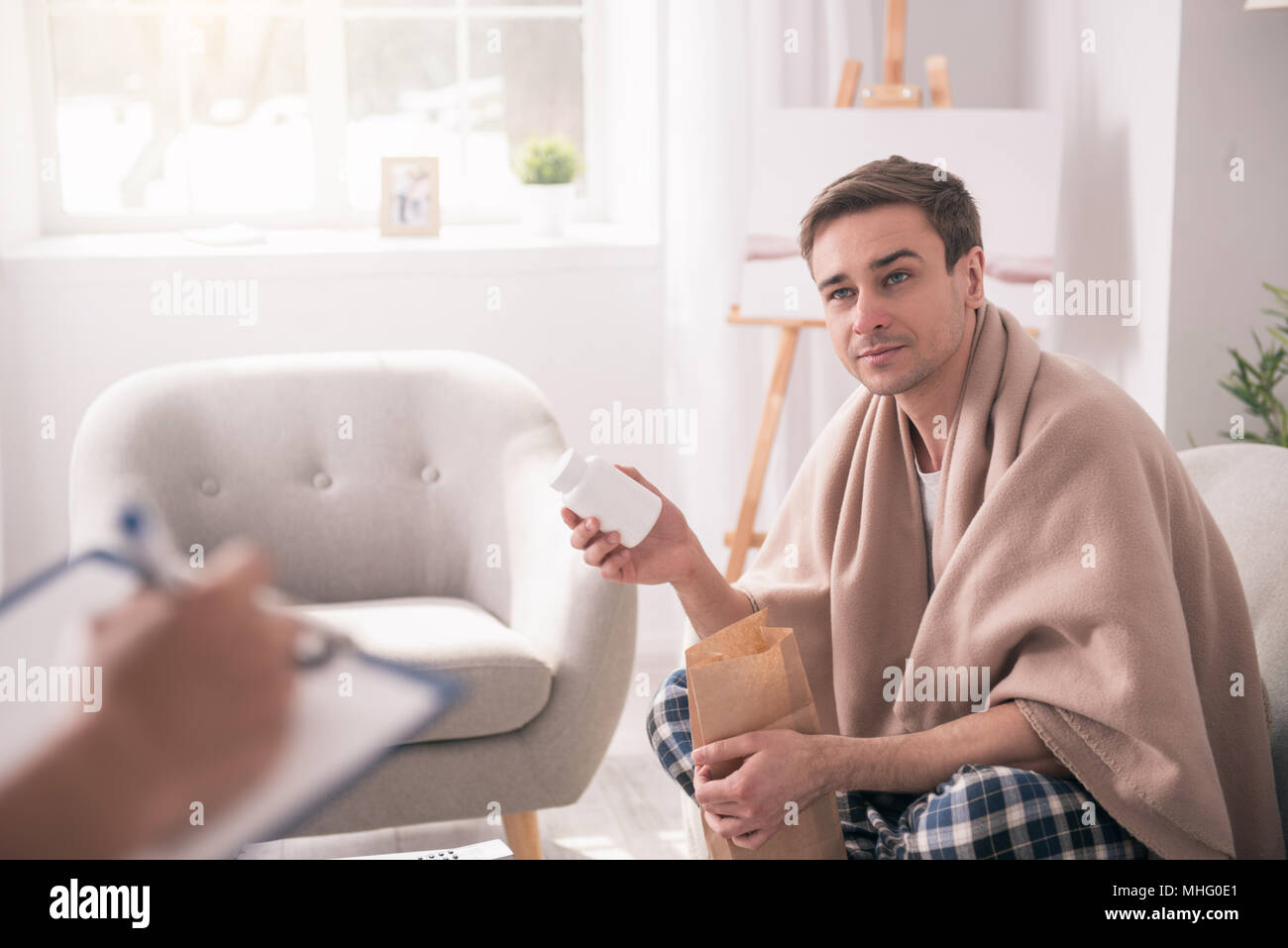 Nice good looking man opening the package Stock Photo - Alamy