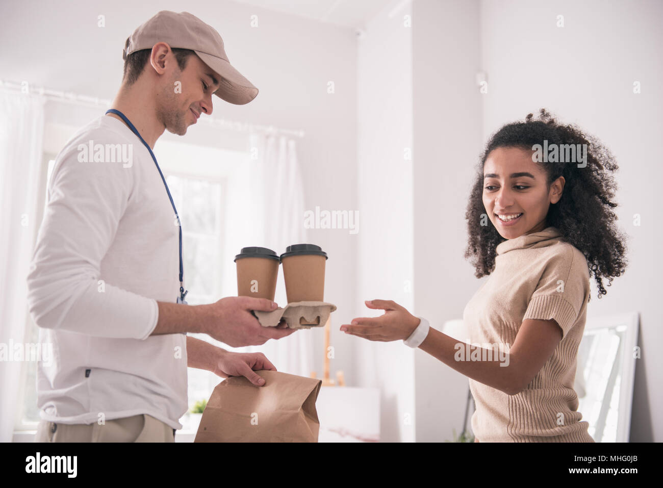 Happy delicious woman taking her lunch Stock Photo - Alamy