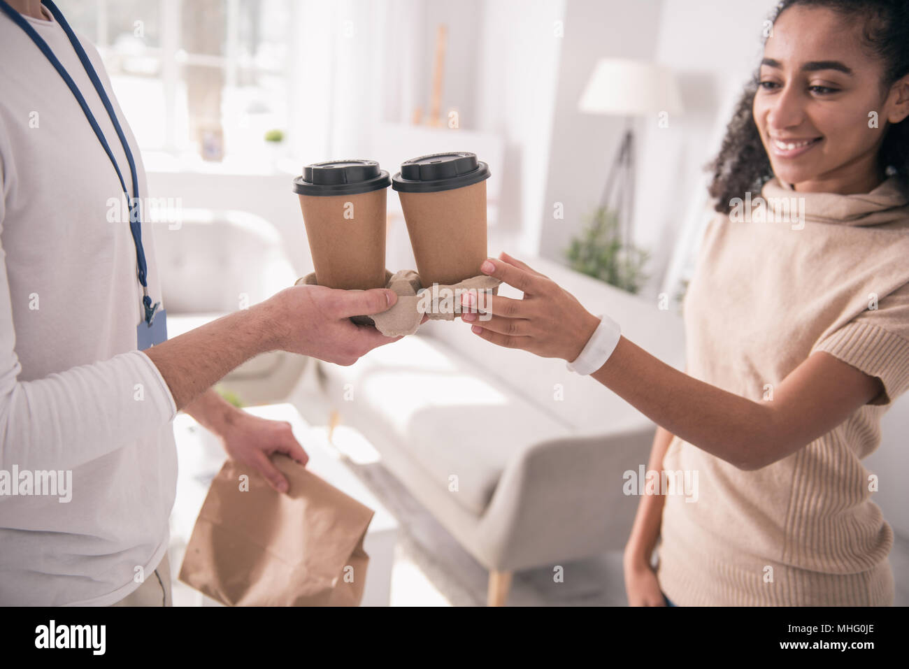 Delivery man drink coffee hi-res stock photography and images - Alamy
