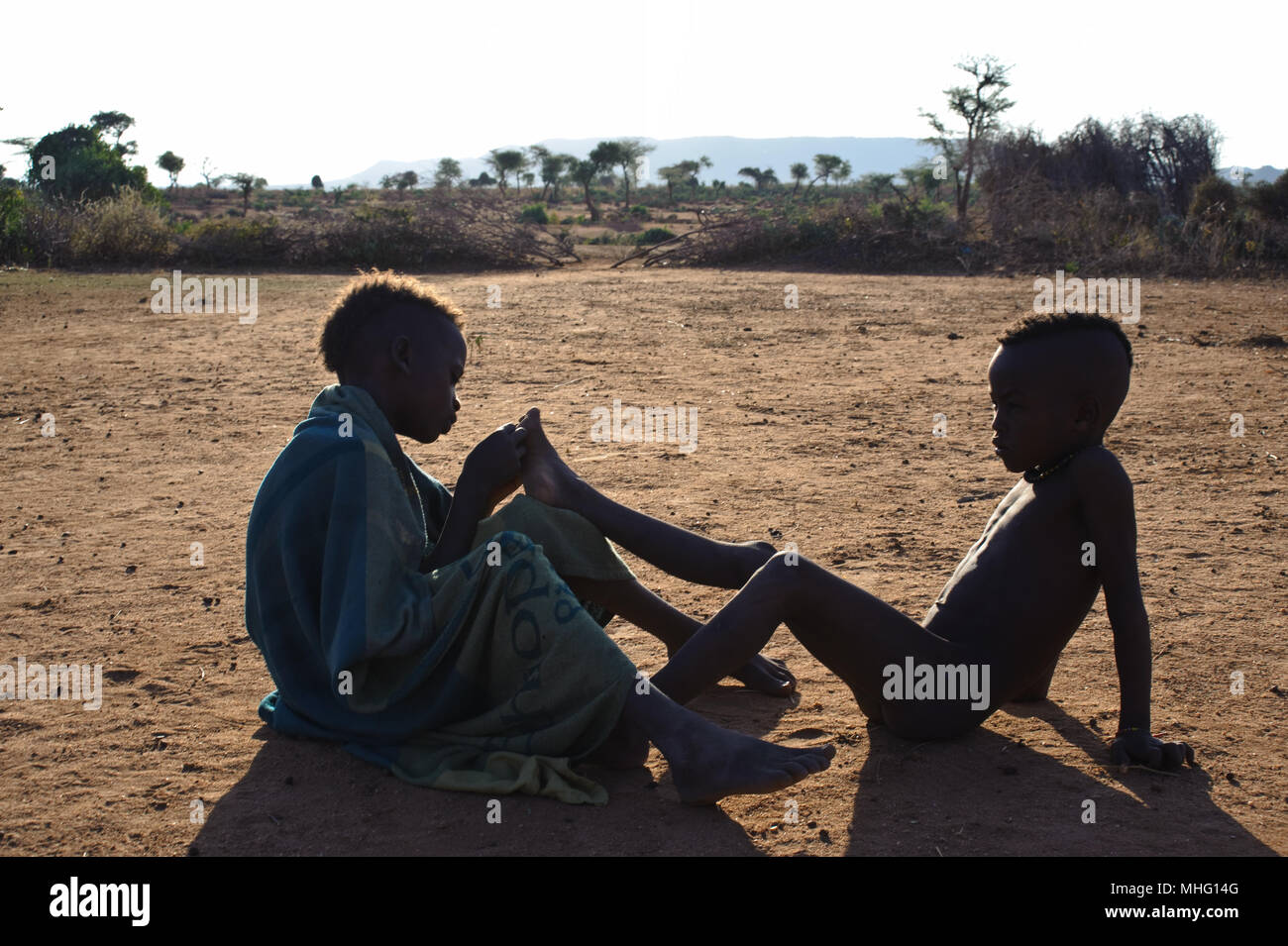 Boy removing thorn hi-res stock photography and images - Alamy
