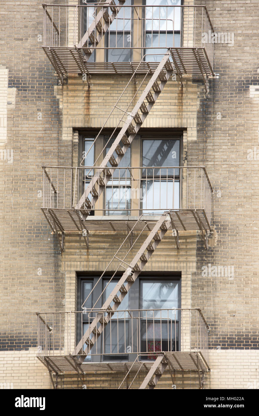 Fire ladder on New york manhattan buildings Stock Photo - Alamy