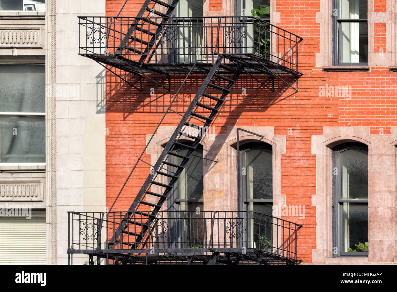 Fire ladder on New york manhattan buildings Stock Photo - Alamy