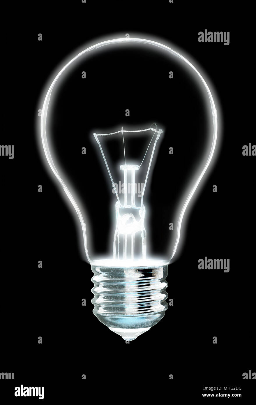 Outline of old tungsten lightbulb glowing white , on black background ...