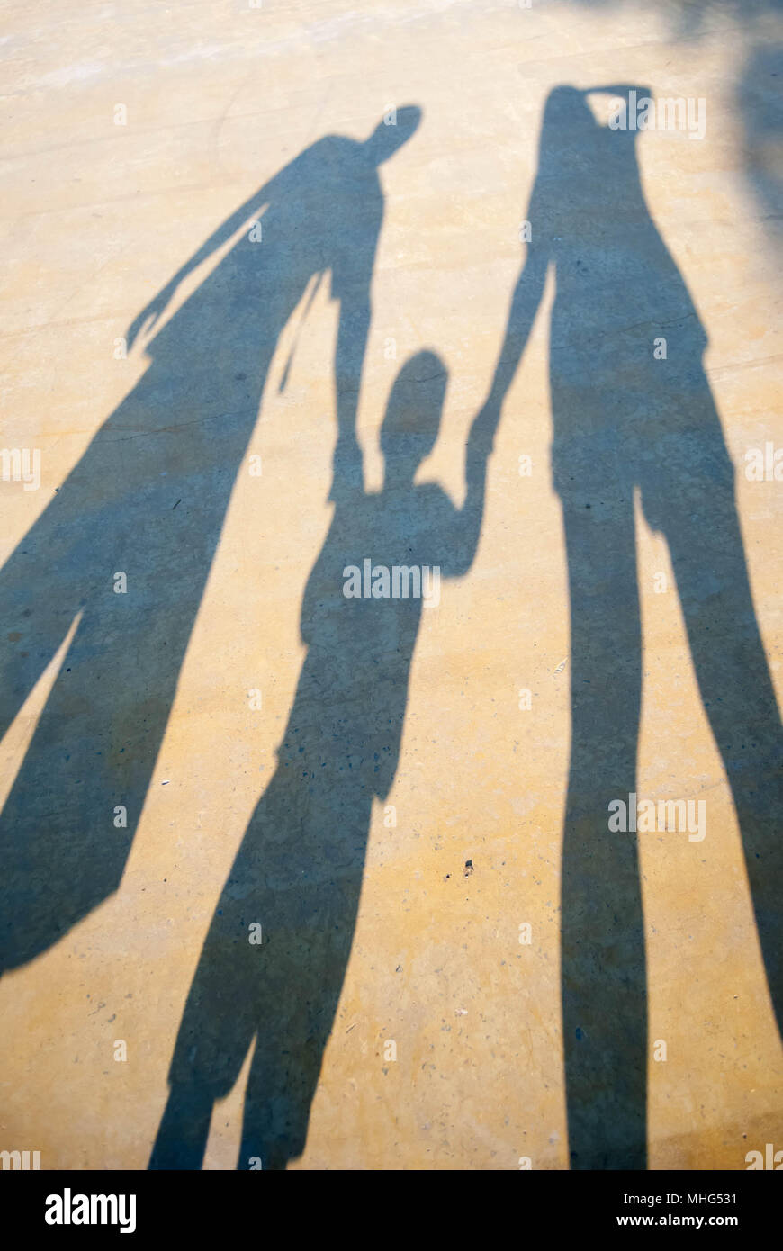 Mother son child together shadow hi-res stock photography and images ...