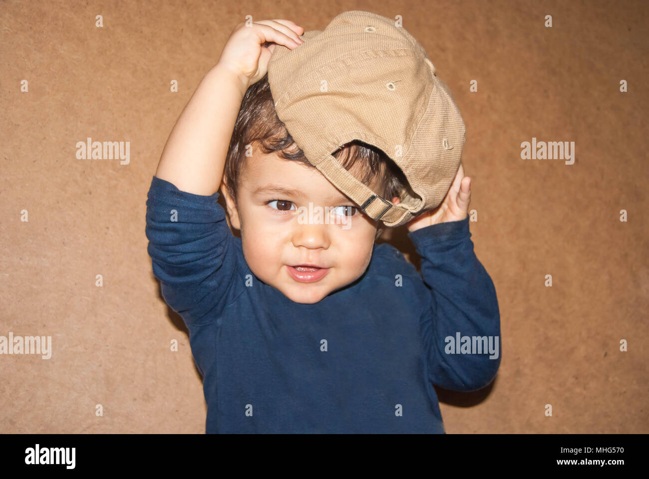 cute little boy in a baseball cap Stock Photo - Alamy
