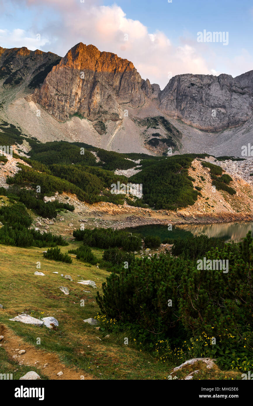 Sunset with Colored in red rock Around Sinanitsa peak and the lake ...
