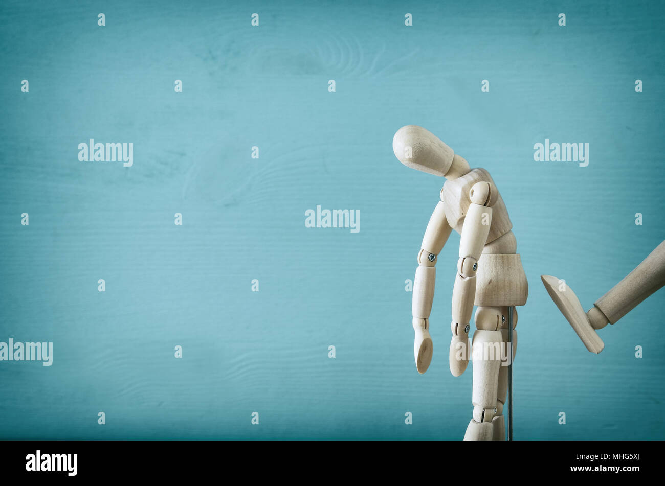 violence cincept. sad wooden dummy Stock Photo - Alamy