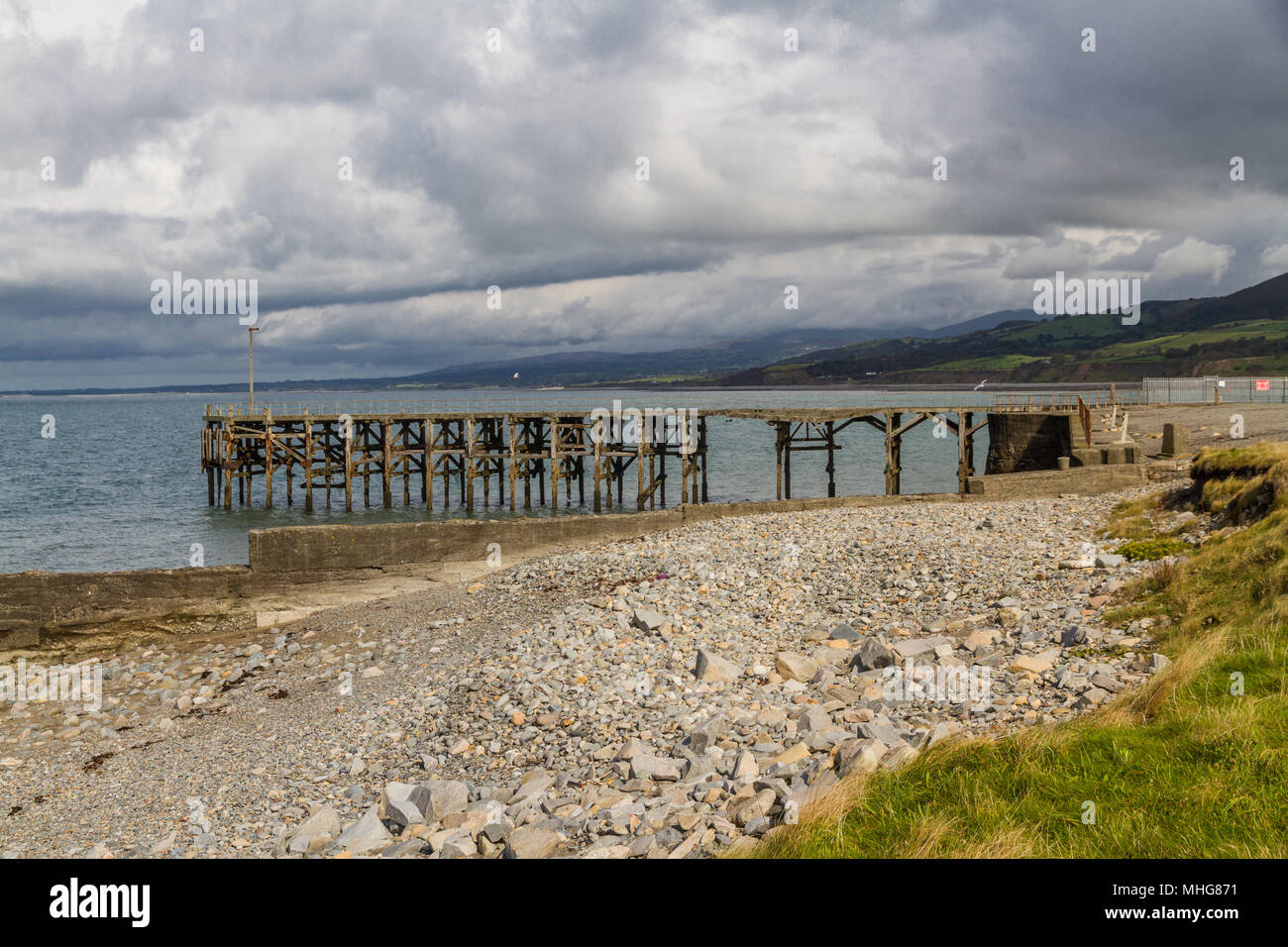 The derelict wooden pier at Trefor, llyn Peninsula, North Wales, UK ...