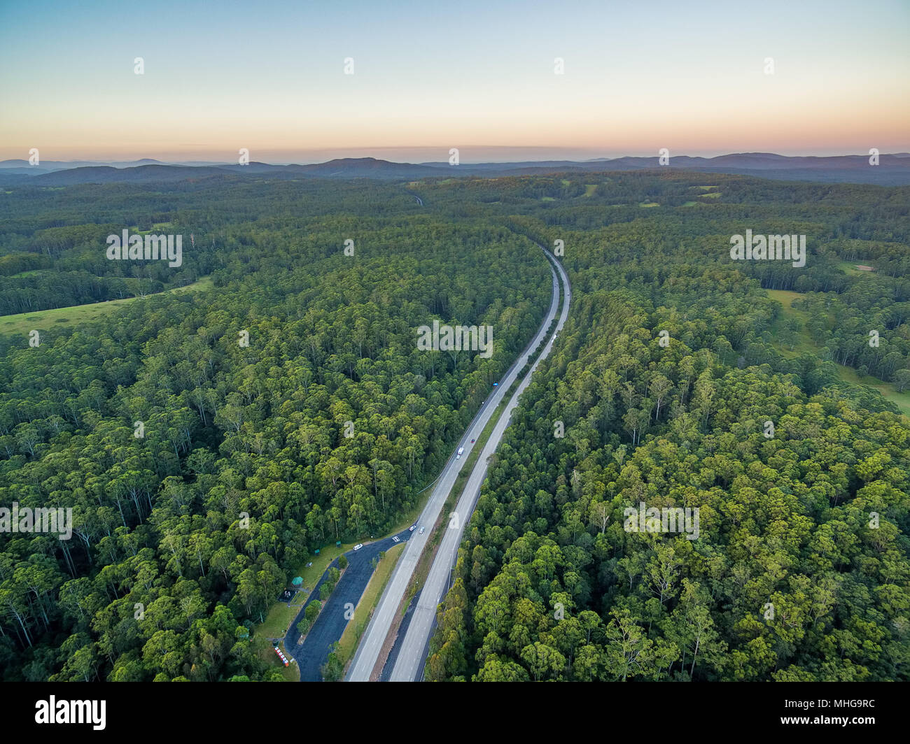 Pacific Highway and native Australian forest at dusk Stock Photo - Alamy