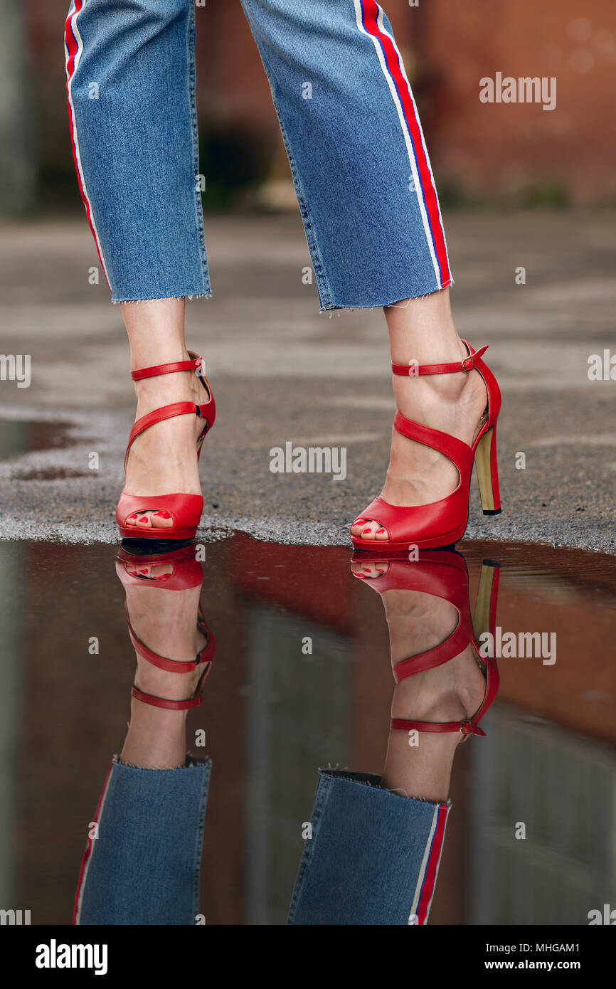 Girl walking in puddle hi-res stock photography and images - Alamy