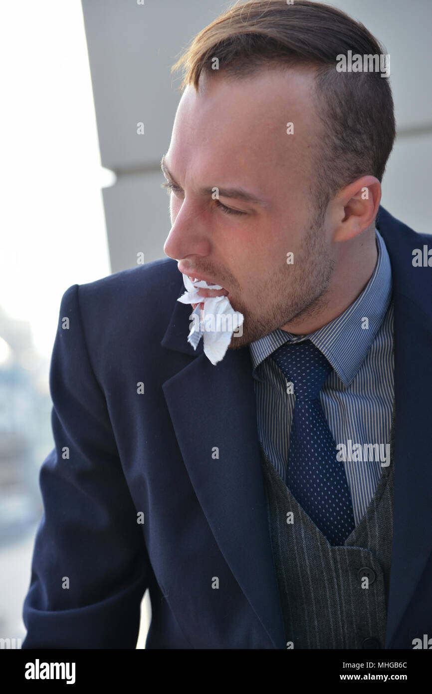 Man tear to pieces sheet of paper hi-res stock photography and images ...