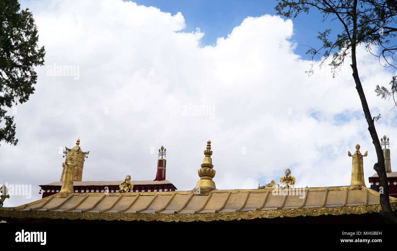 Brass statue on the roof with sky Stock Photo - Alamy