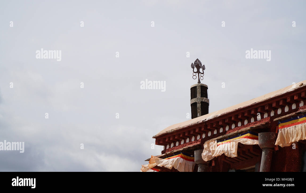 Brass statue on the roof with sky Stock Photo - Alamy