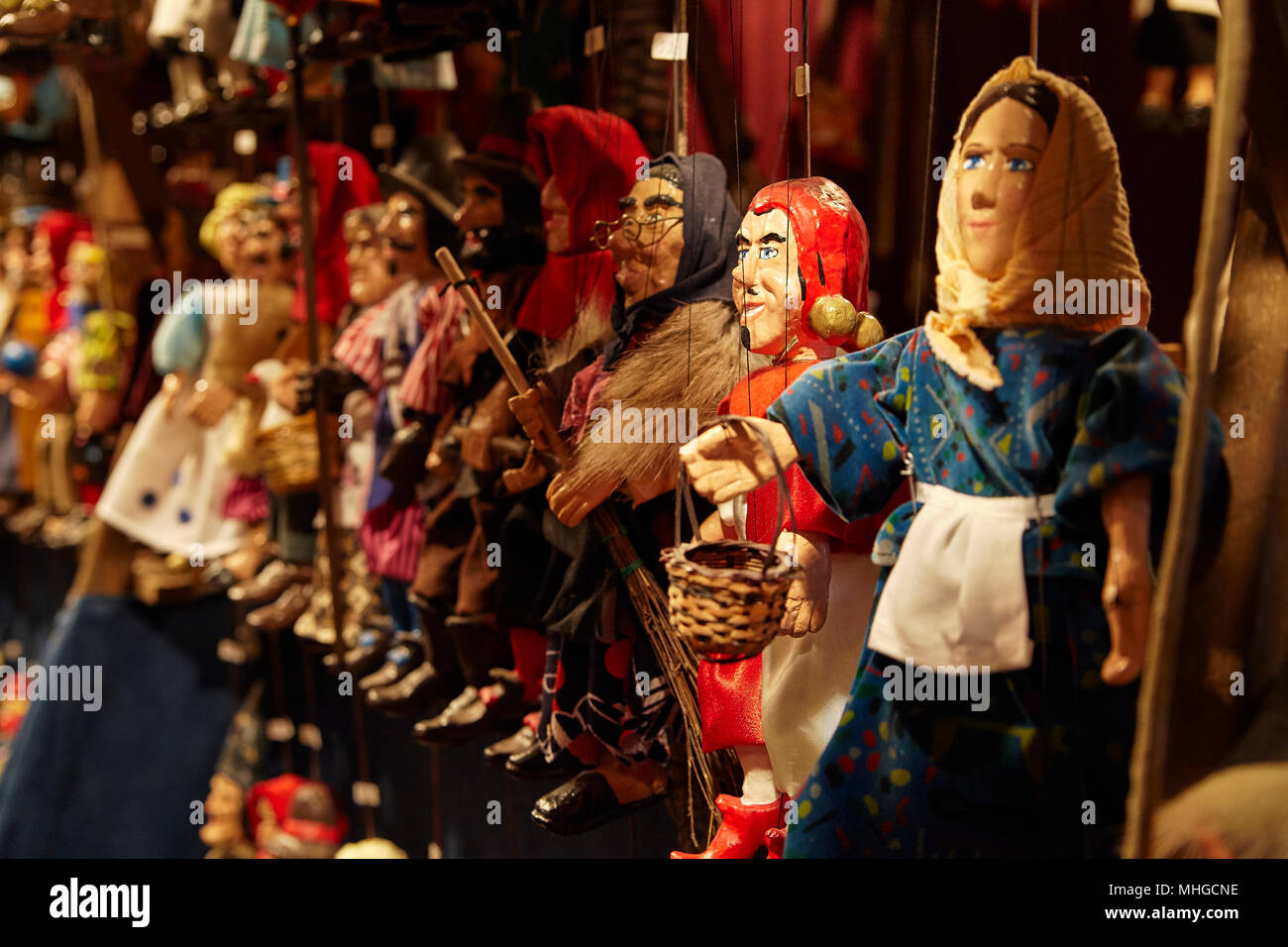 Handmade Wooden Puppets in a Row with Dark Lighting Stock Photo - Alamy