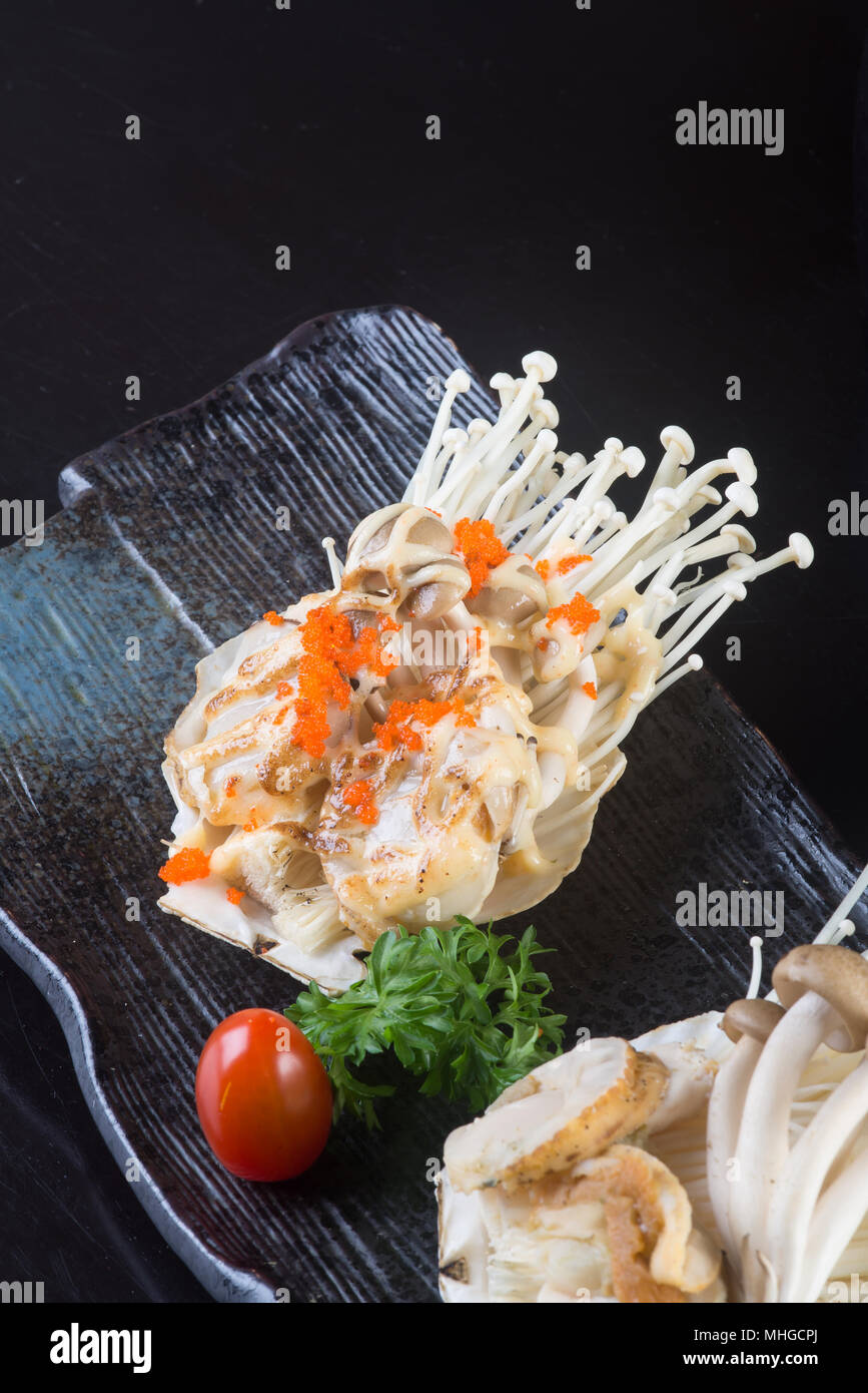 japanese cuisine. grilled shell fish on background Stock Photo - Alamy