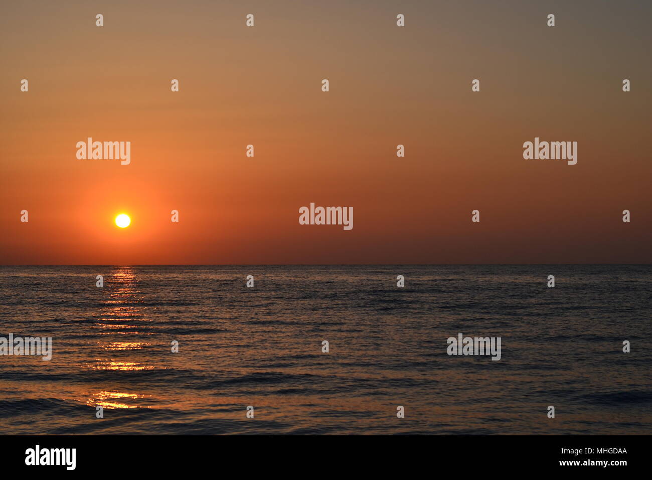 Dramatic Sunrise over the sea Stock Photo - Alamy