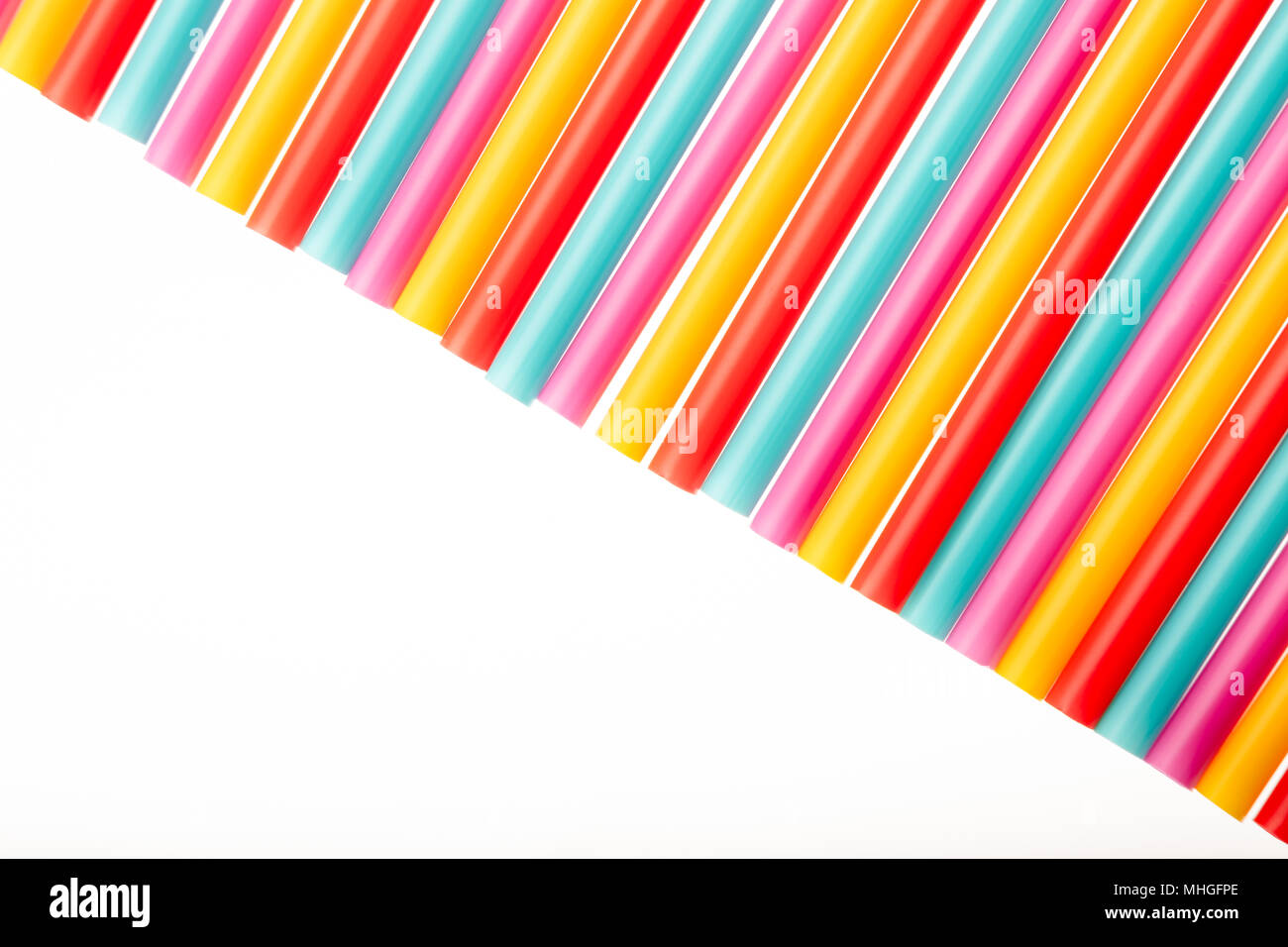 Top view of drinking straw colorful plastic tubes over white as ...