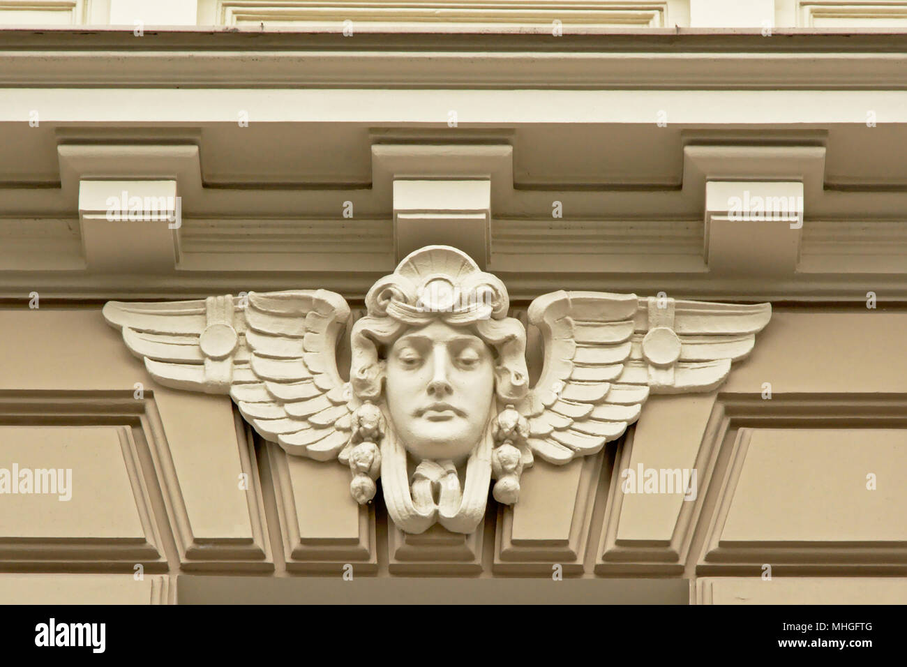 Art deco style decoration of head with wings Stock Photo - Alamy