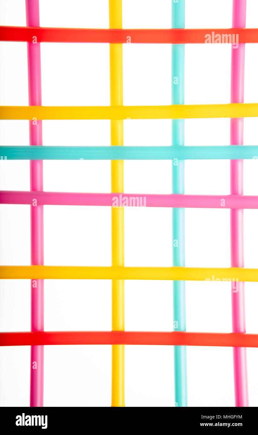 View of a colored pattern with lines of different colors straws on ...