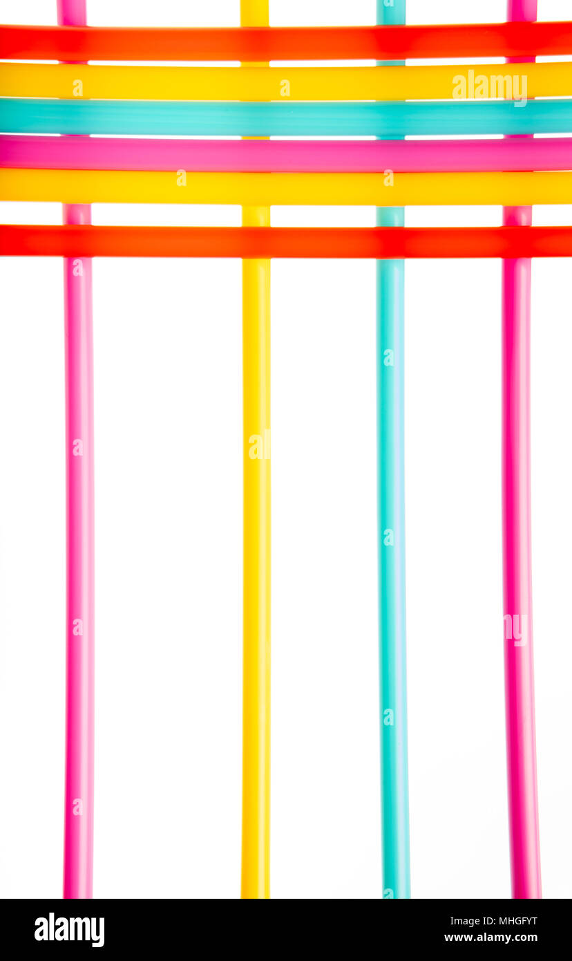 Background with multicolored straws parallel and crossed lines on white ...