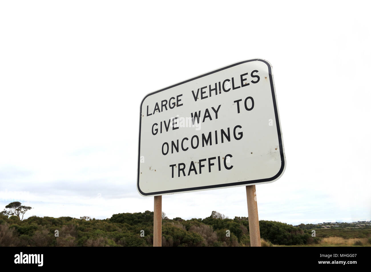 Give way to oncoming vehicles sign hi-res stock photography and images ...