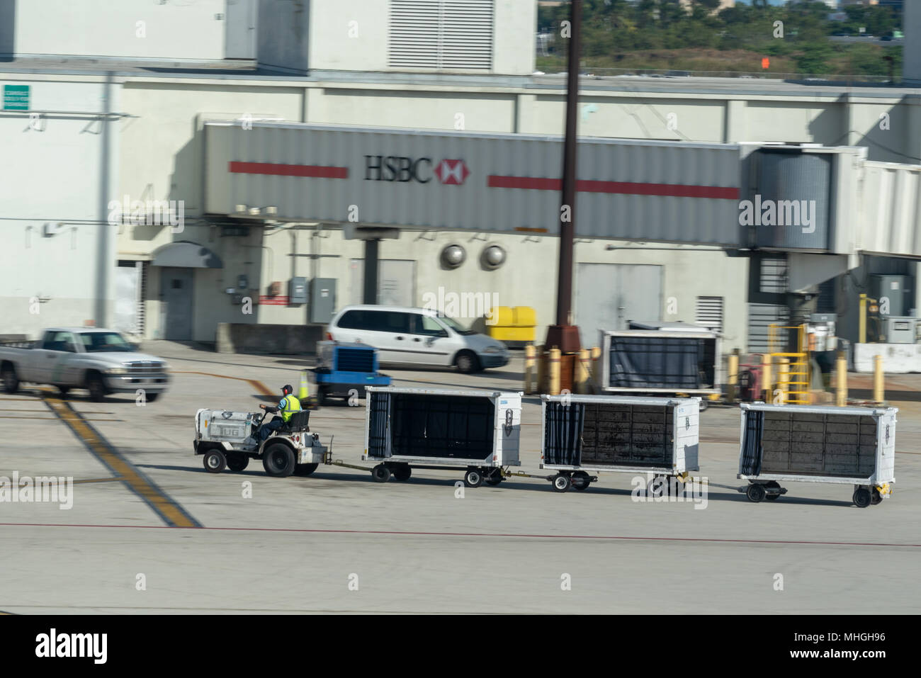 Baggage tractor hi-res stock photography and images - Alamy