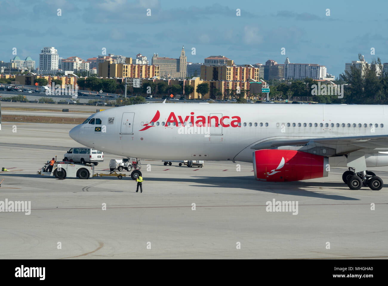 Avianca Airlines jet being pushed back at Miami International Airport ...