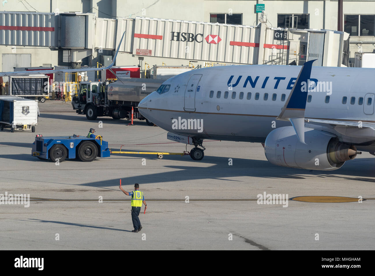 United Airlines jet being pushed back at Miami International Airport in ...