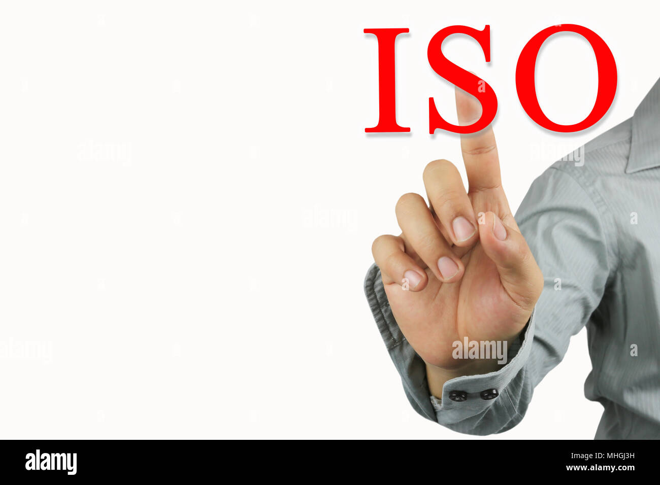 Hand of businessman point to the red ISO text isolated on white ...