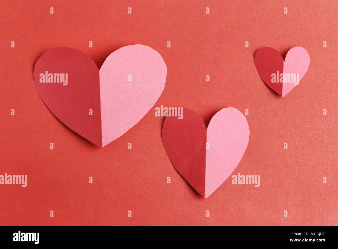Heart shape of paper on the red cardboard background in Concept for ...